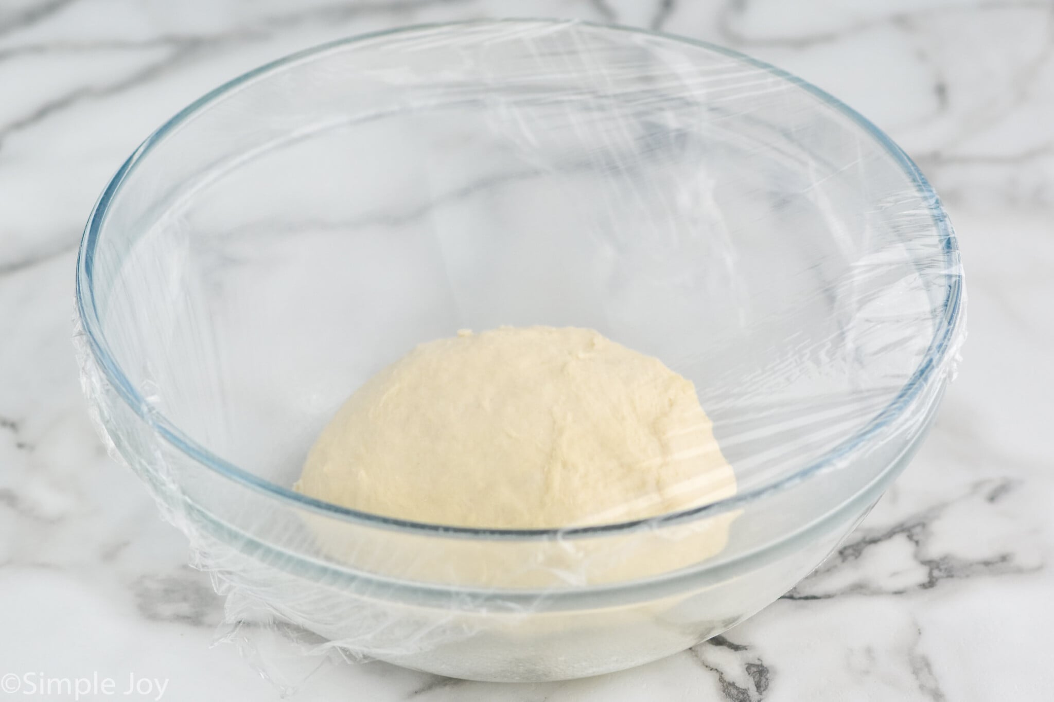 The Secret To The Perfect Pizza Dough Recipe - Simple Joy