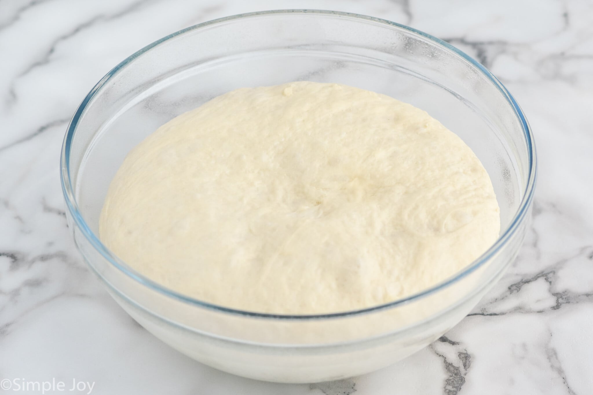 The Secret To The Perfect Pizza Dough Recipe - Simple Joy